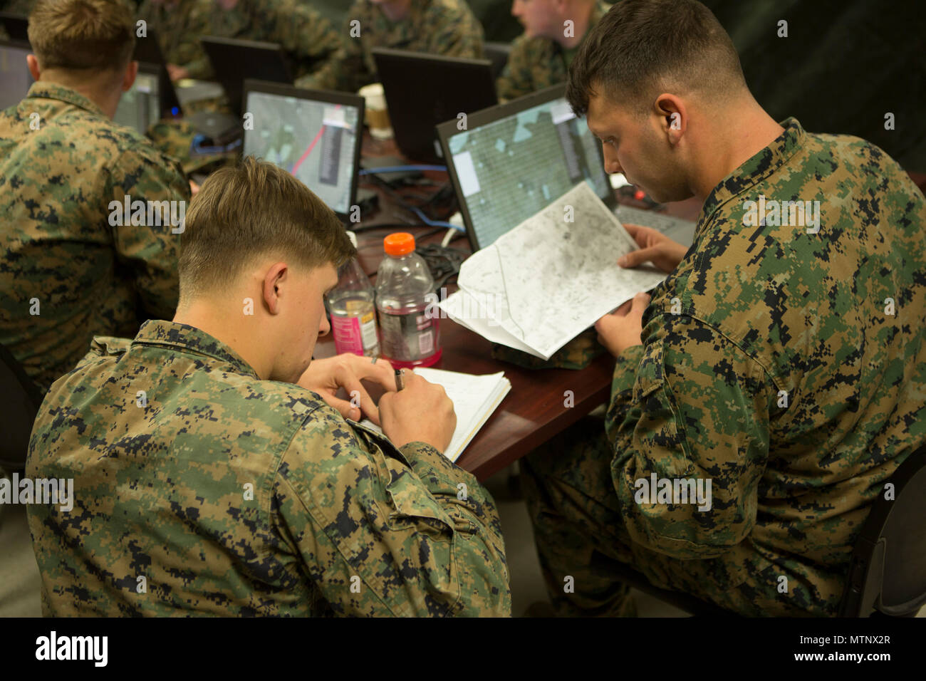 U.S. Marine Corps Cpl. Christian T. Sprague, left, a mortarman with ...