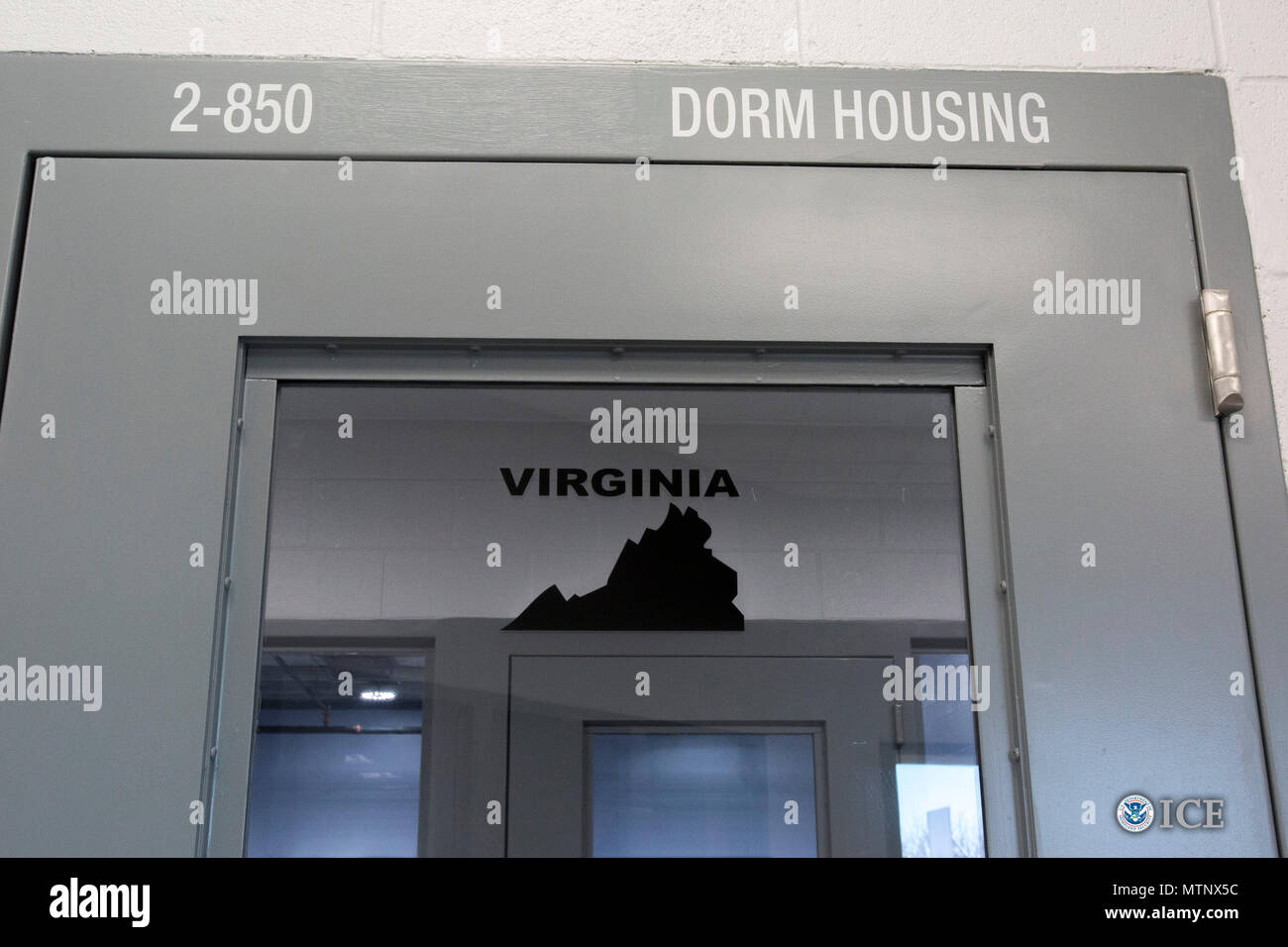 Transgender dorm room door Stock Photo - Alamy