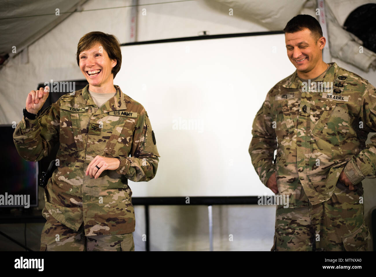 U.S. Army Col. Paula Lodi, left, and U.S. Army Command Sgt. Maj ...