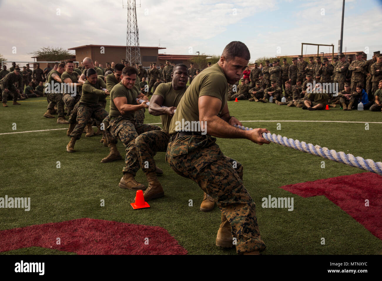 U.S. Marines with Marine Wing Support Squadron 371 forcefully take the ...