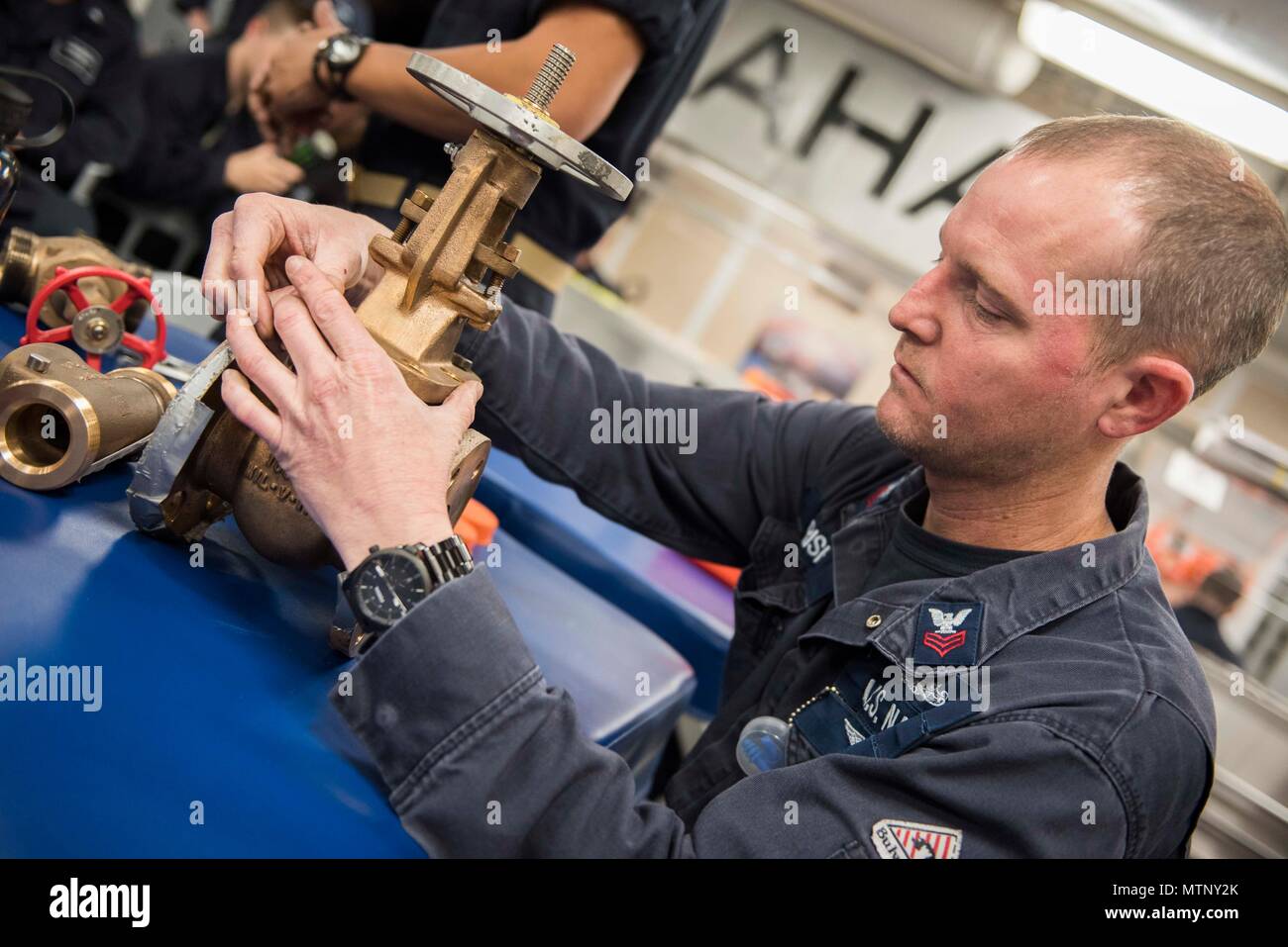 170111-N-CS953-020 ARABIAN SEA (Jan. 12, 2017) Machinist Mate 1st Class ...