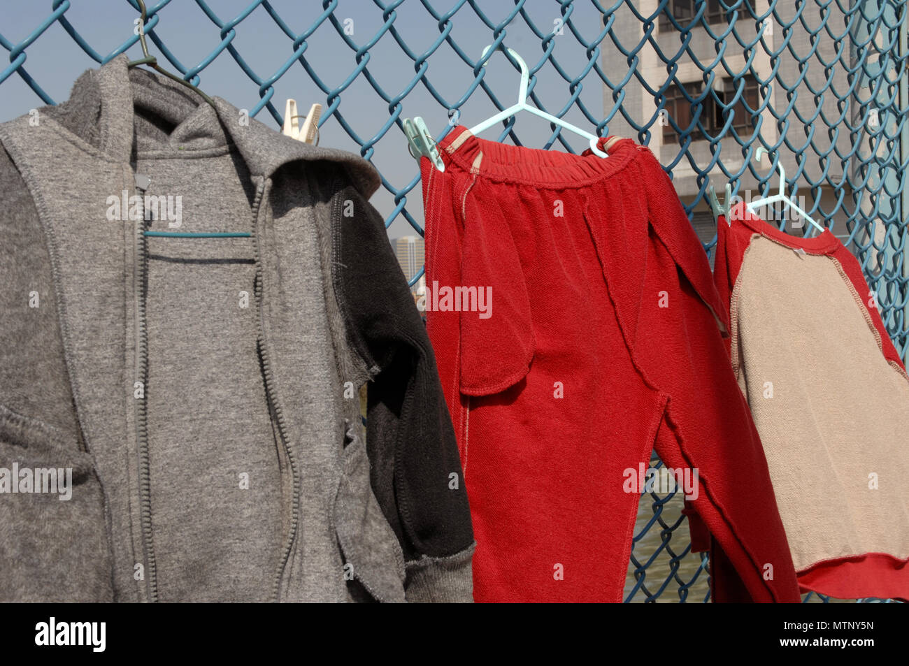 Hanging clothes on fence dry hi-res stock photography and images - Alamy