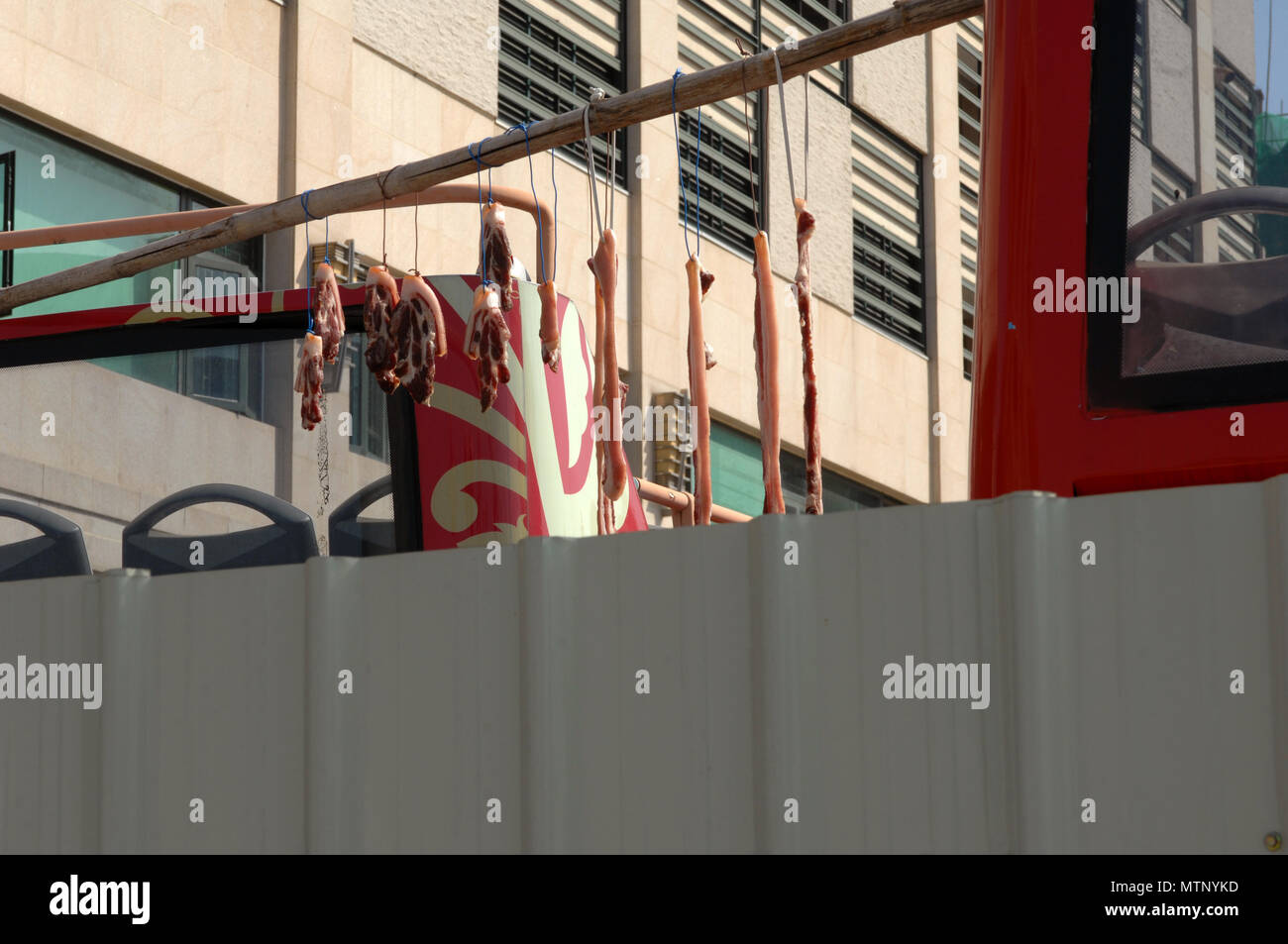 Filets of fish hanging on fence to dry in sunshine, Macao, China Stock ...