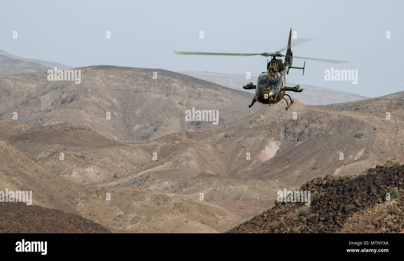 A French SA 342 Gazelle utility helicopter fperforms a fly-by during ...