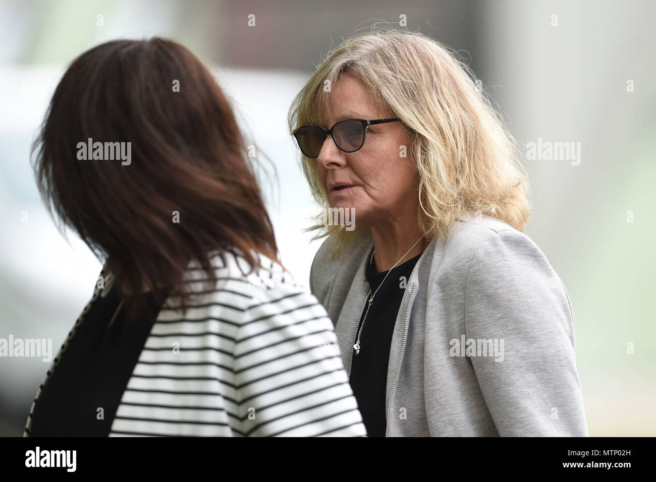 Cherise Lyons, 57, (right) of Dagenham, arrives at Basildon Combined ...