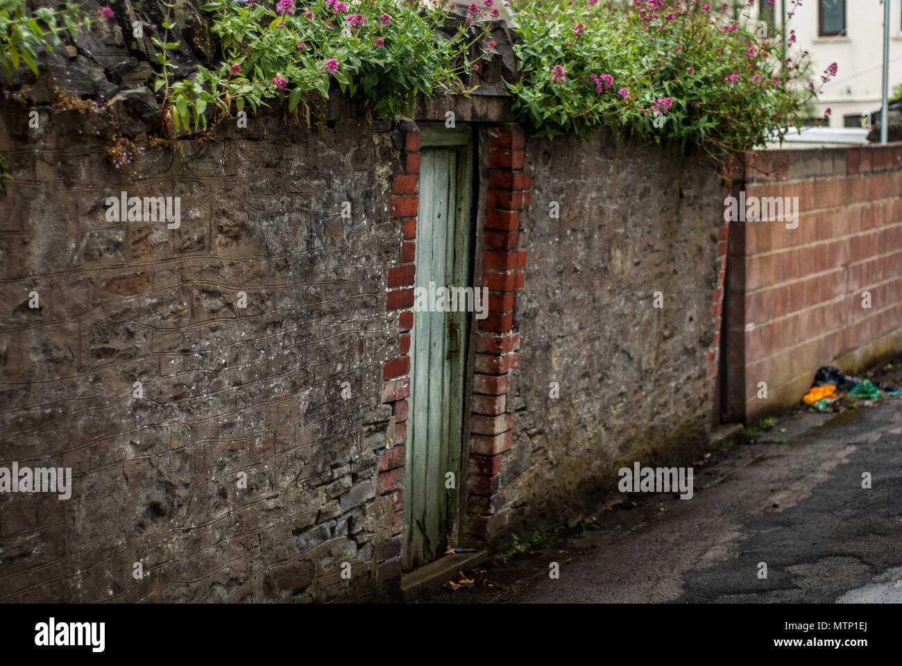 Walls in an alley Stock Photo - Alamy