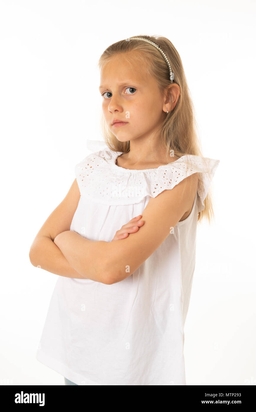 Close up portrait of a cute pretty child looking angry and disappointed ...
