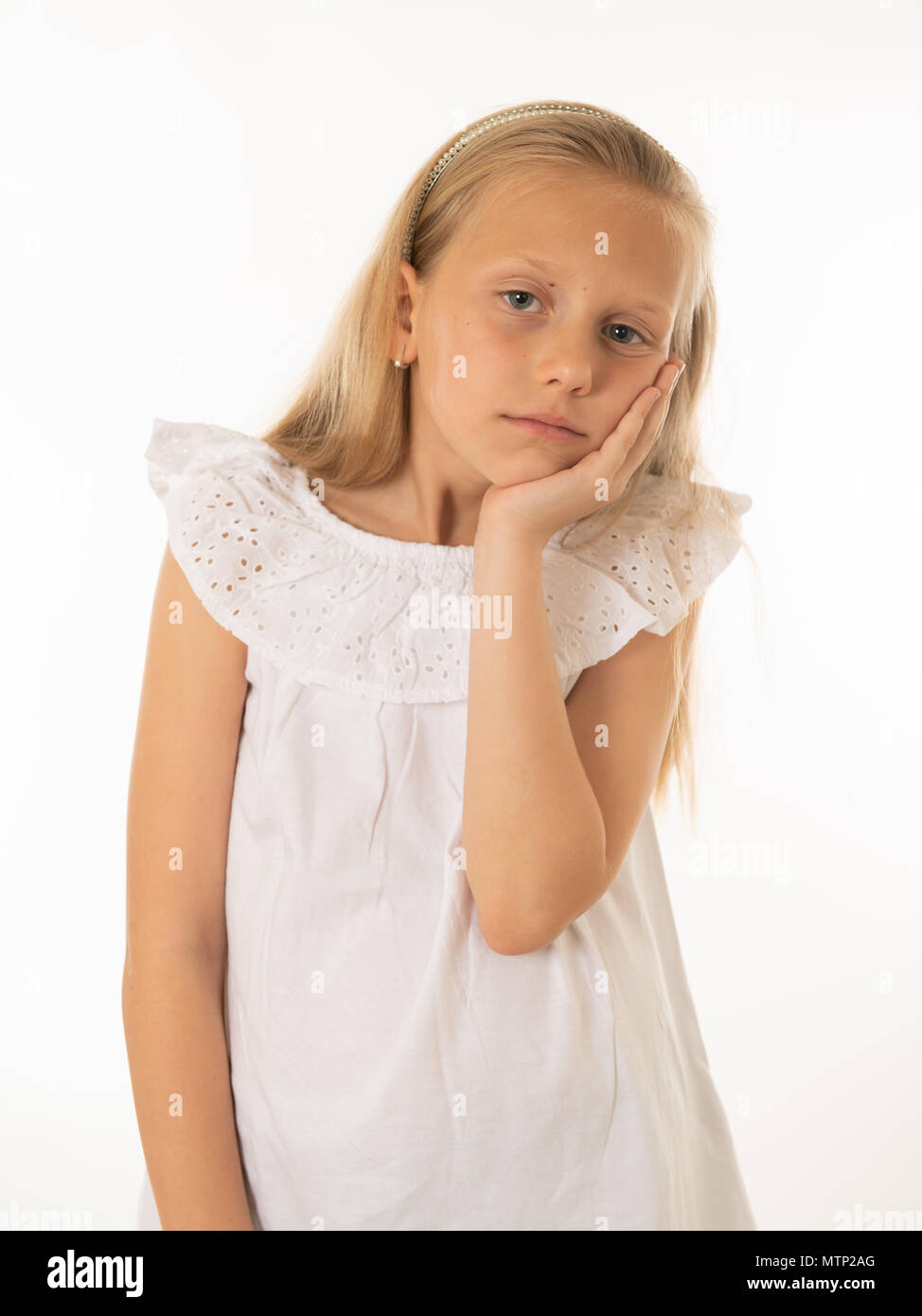 Portrait of a pretty bored, depressed, alone, tired, disappointed child ...