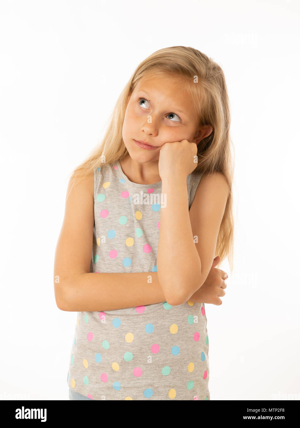 Portrait of a pretty bored, depressed, alone, tired, disappointed child ...