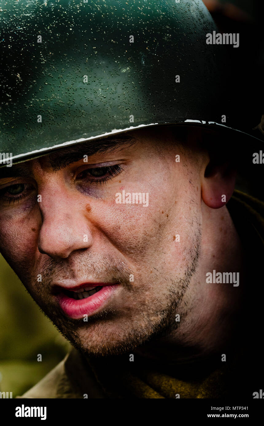 Portrait of an American GI soldier from World War Two with a dirty face ...