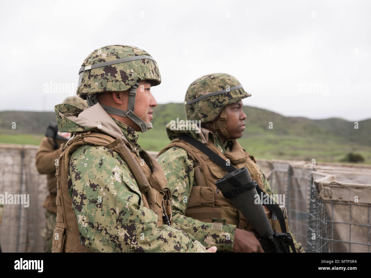 CAMP PENDLETON, Calif. (Jan. 23, 2017) – Lt. Yipming Tang, left ...