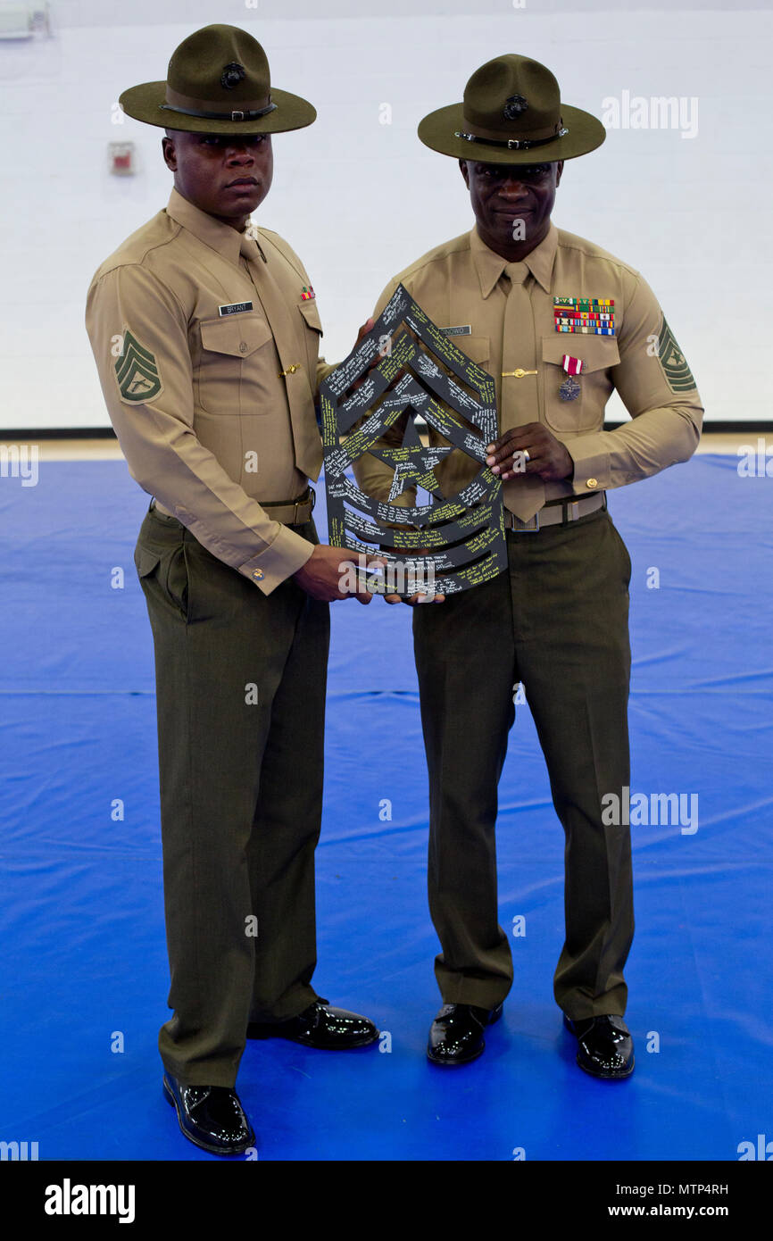 U.S. Marine Corps Staff Sgt. Donell D. Bryant, left, with S-3, Support ...