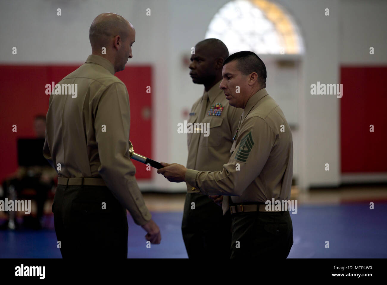 U.S. Marine Corps Sgt. Maj. Gerardo C. Ybarra, right, offgoing sergeant ...