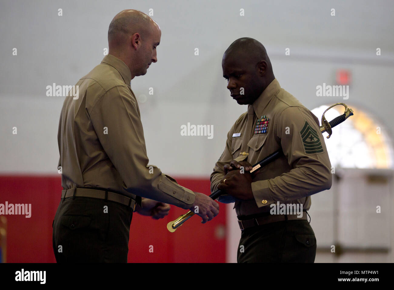 U.S. Marine Corps Lt. Col. Jared C. Voneida, left, commanding officer ...