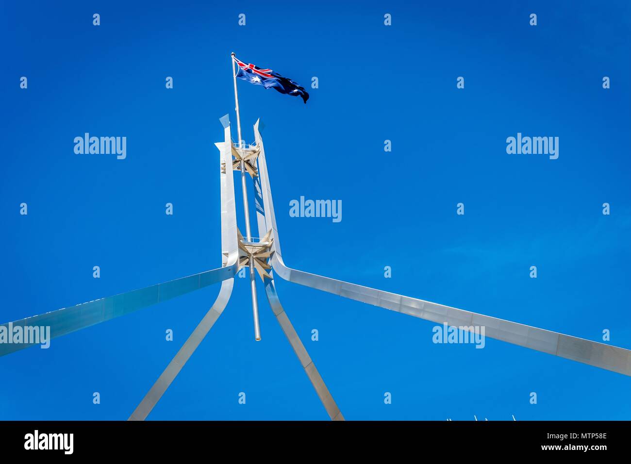 Australian flag flying on top of the Parliament House in Canberra Stock ...