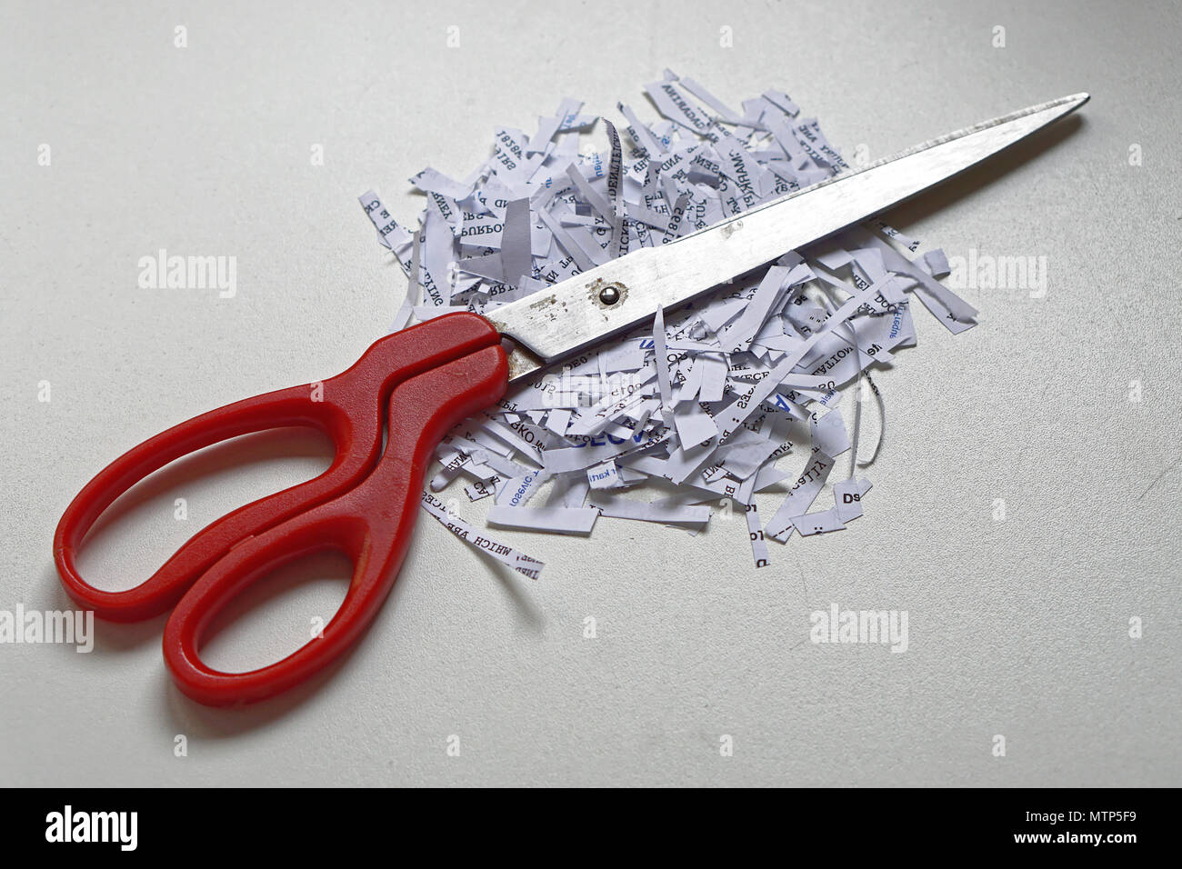 Shredded private documents papers and scissors Stock Photo - Alamy