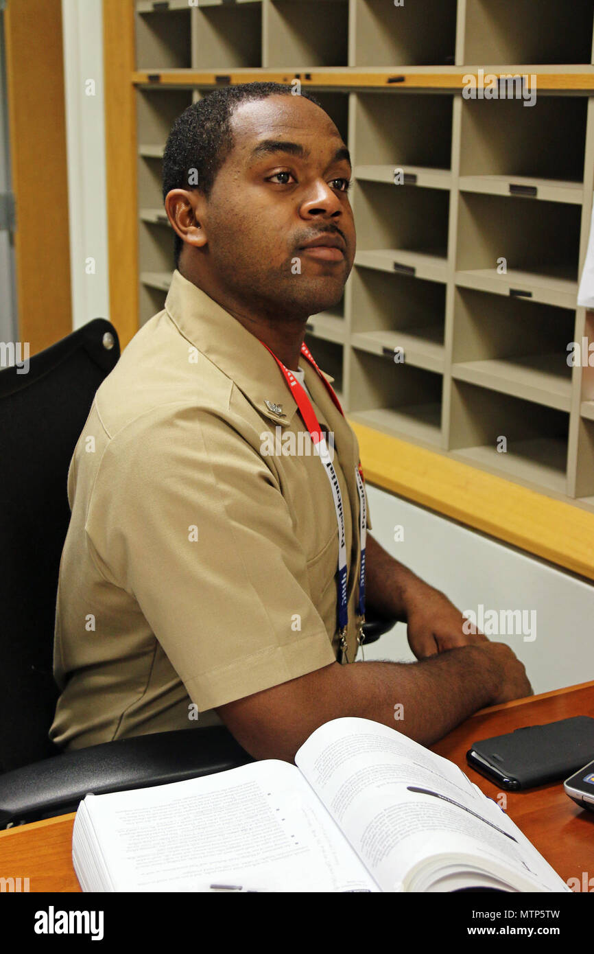 Petty Officer 3rd Class Joshua Williams, an access control master of ...