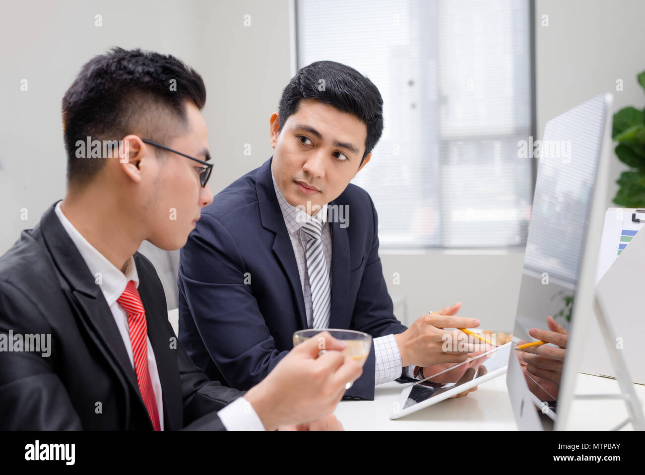 portrait of a good team work at office Stock Photo - Alamy