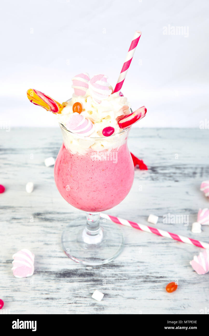 Pink Extreme milkshake with berry, rasberry, strawberry, candy ...