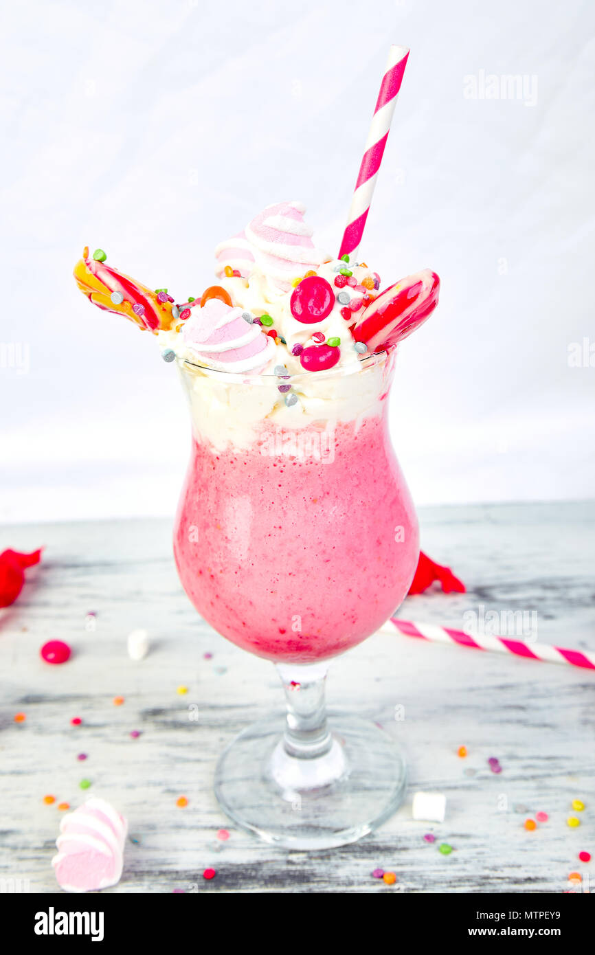 Pink Extreme milkshake with berry, rasberry, strawberry, candy ...