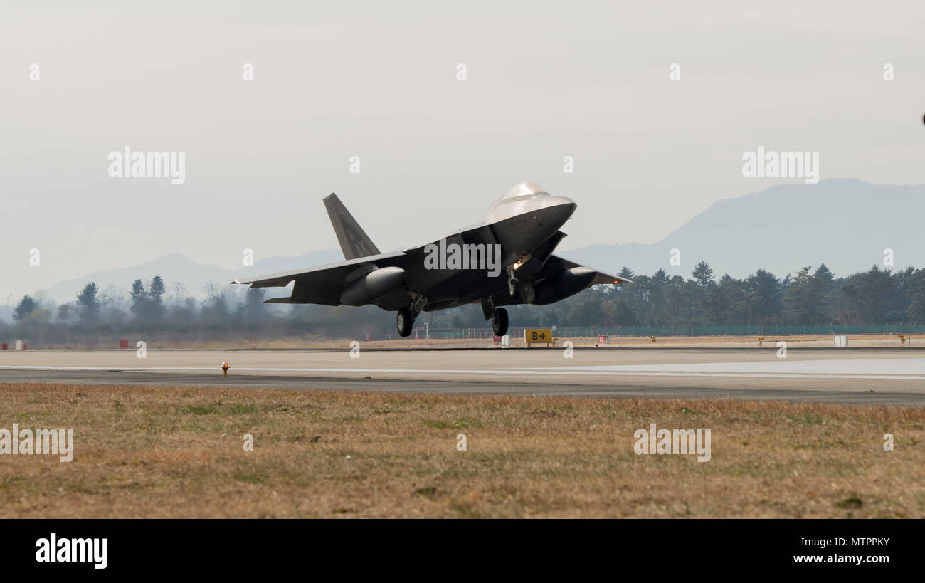 A F-22 Raptor touches down at Gwangju Air Base, Republic of Korea, Dec ...