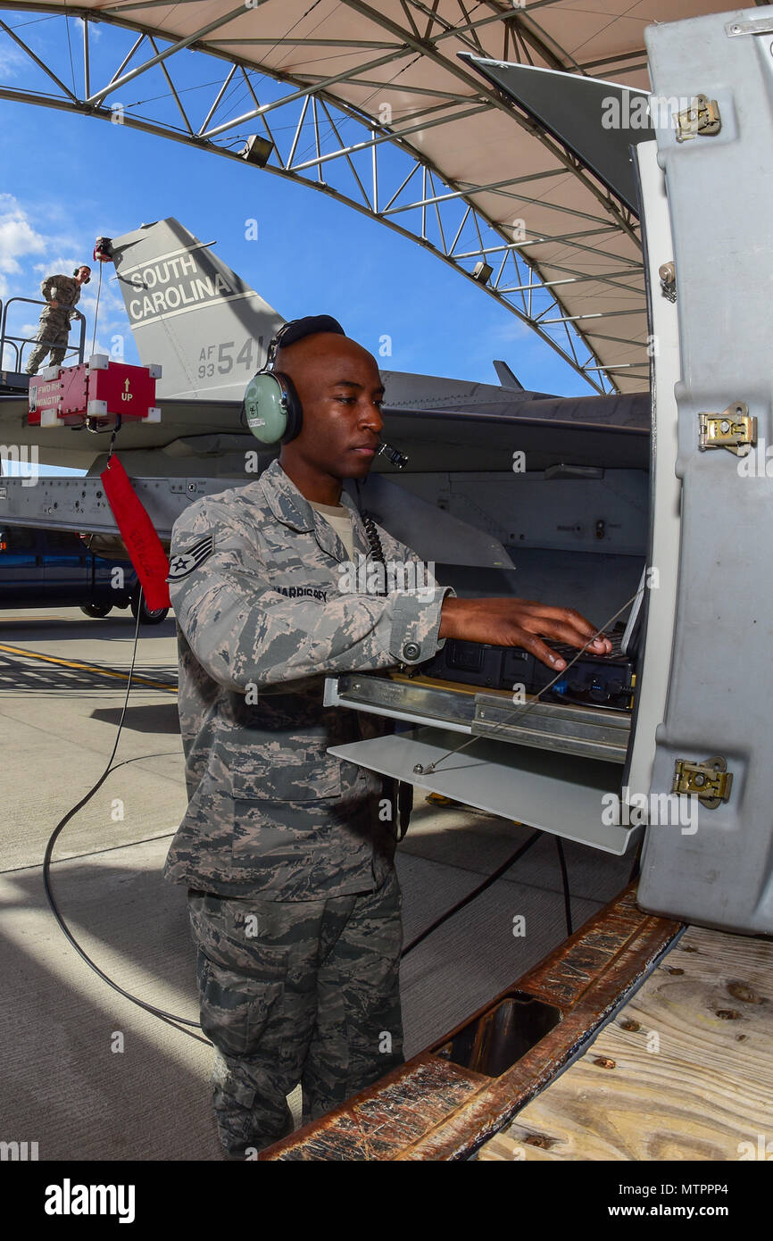 U.S. Air Force Staff Sgt. Timothy Harris-Bey, left, and Senior Airman ...