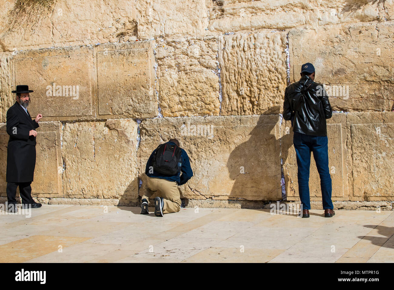 JERUSALEM, ISRAEL - 22 NOVEMBER 2017: Pilgrims pray at the wall of the ...