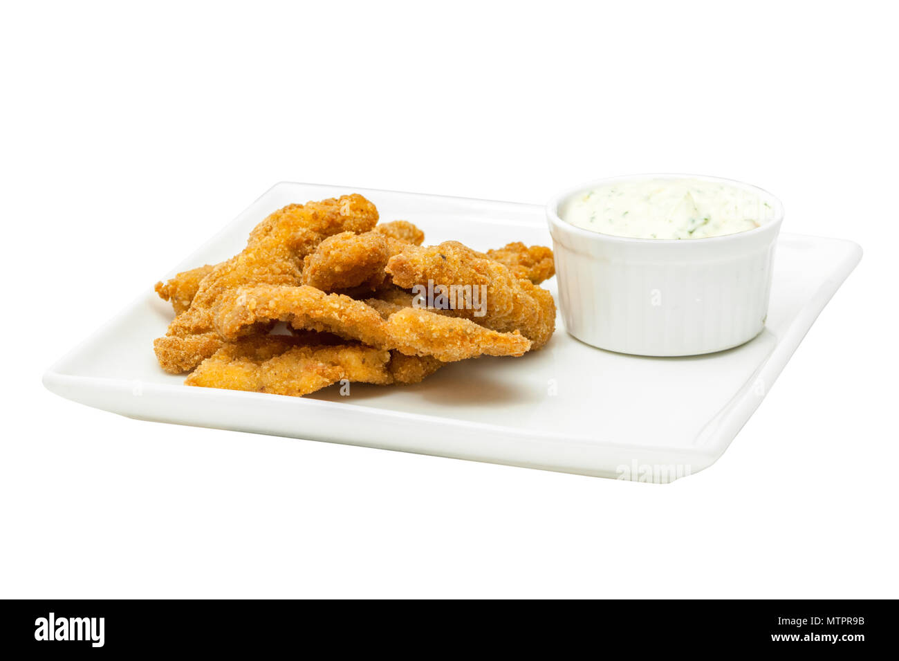 Chicken nuggets with mayonnaise sauce on a square plate Stock Photo - Alamy