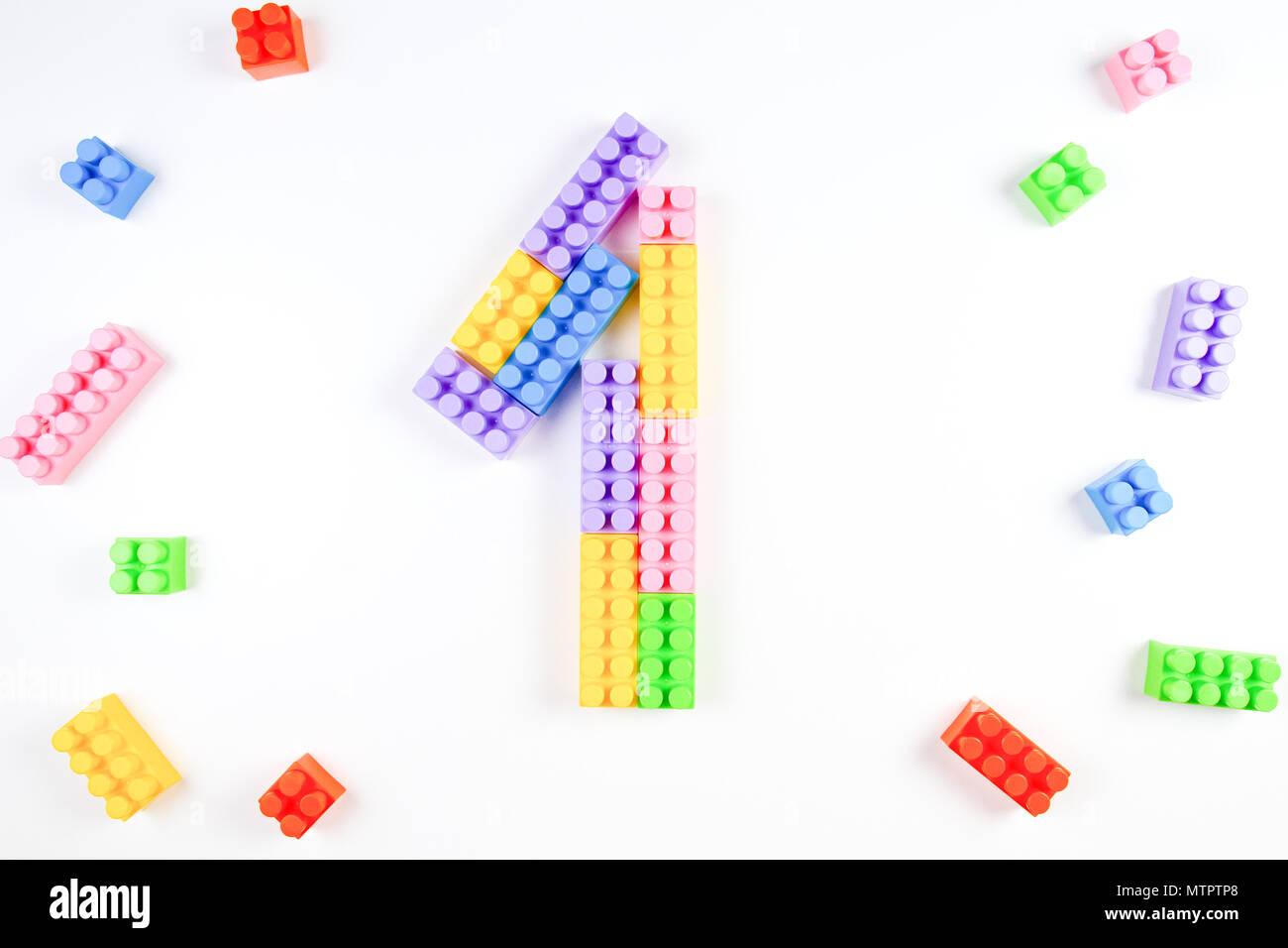 Colorful plastic blocks forming the number one on white background ...