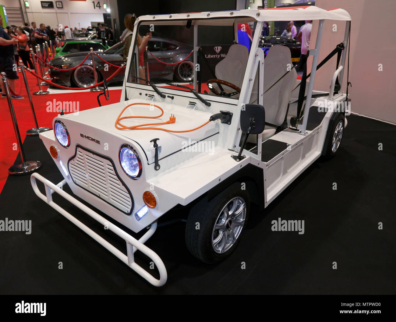 Three-quarter front view of an E-Moke, on display at the 2018 London ...