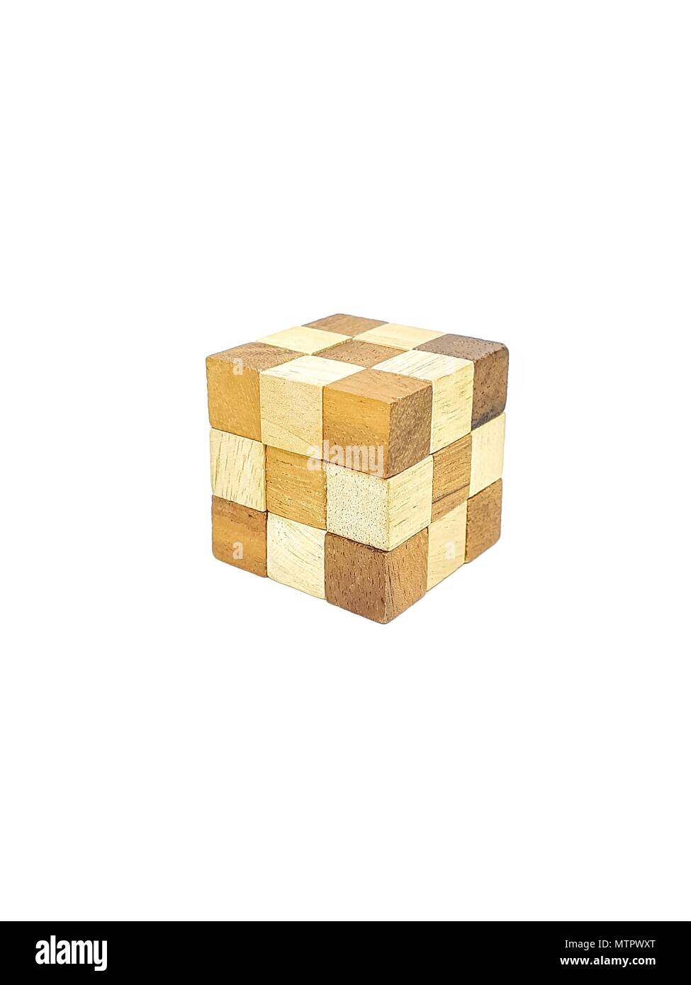 Wooden cube brain teaser on white background Stock Photo - Alamy