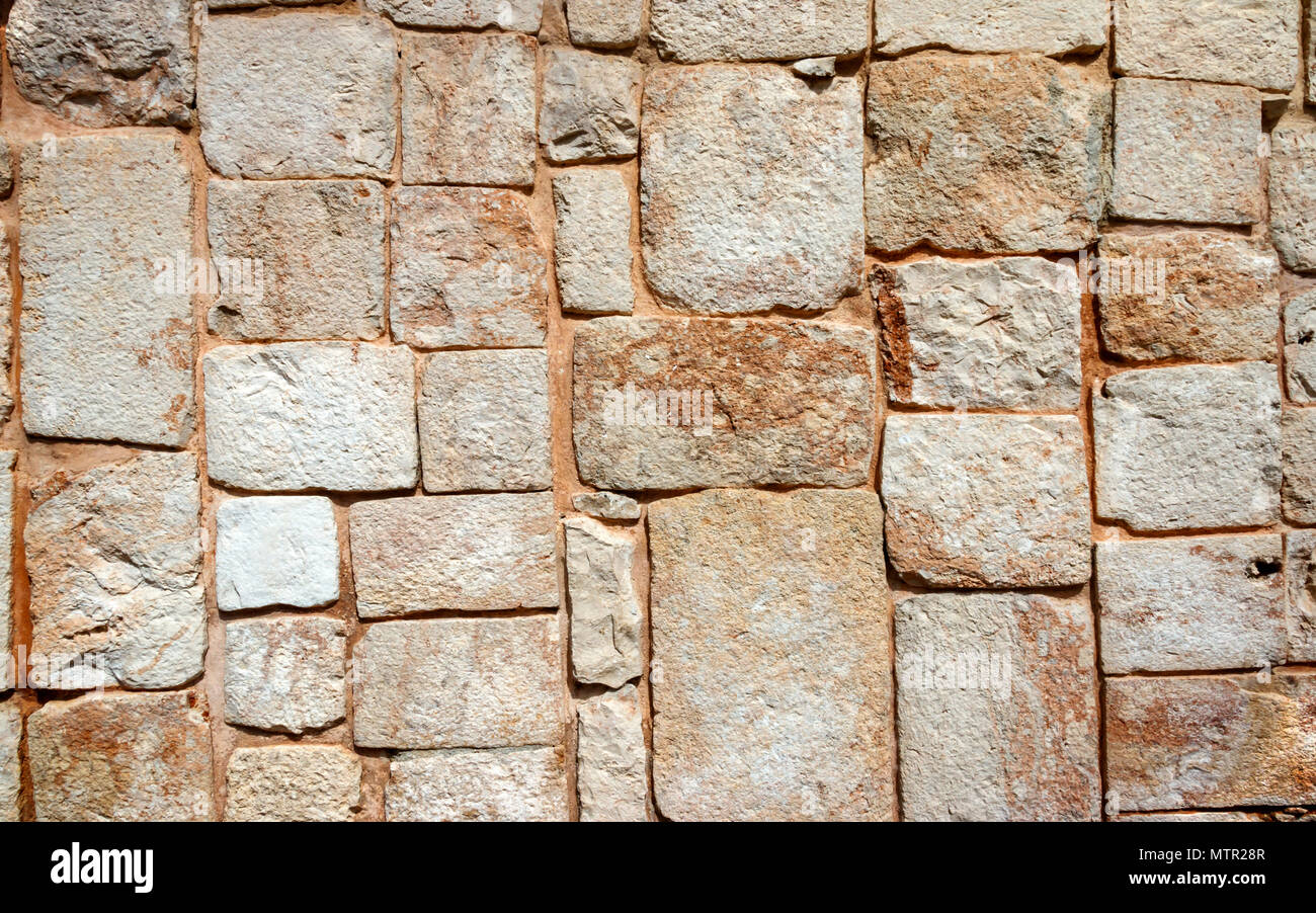 Stone wall of the building of the ancient city of Maya Stock Photo - Alamy