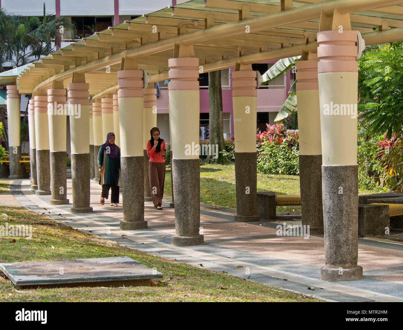 Local residents at an HDB (Housing & Development Board) social housing ...