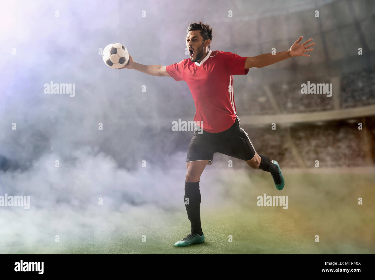 Footballer full body hi-res stock photography and images - Alamy