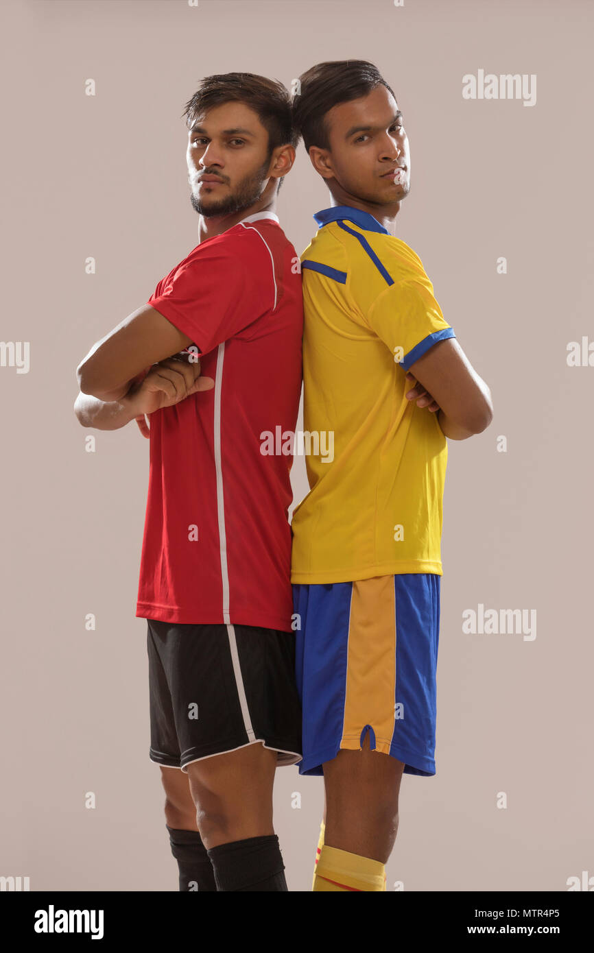 Portrait two football players standing hi-res stock photography and ...