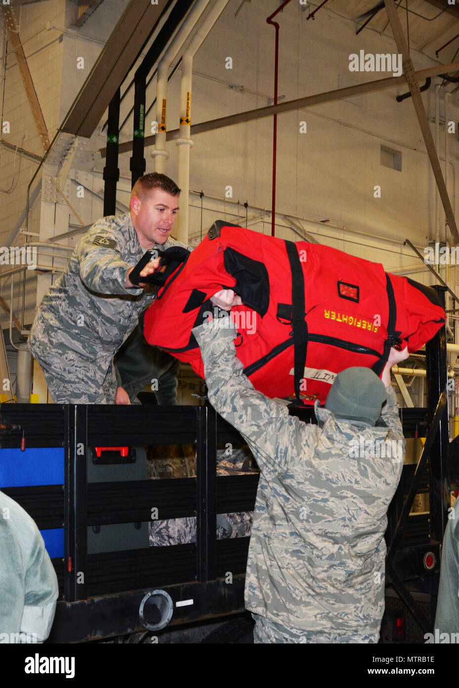 Tech. Sgt. Kevin Giles of the 507th Security Forces Squadron loads ...