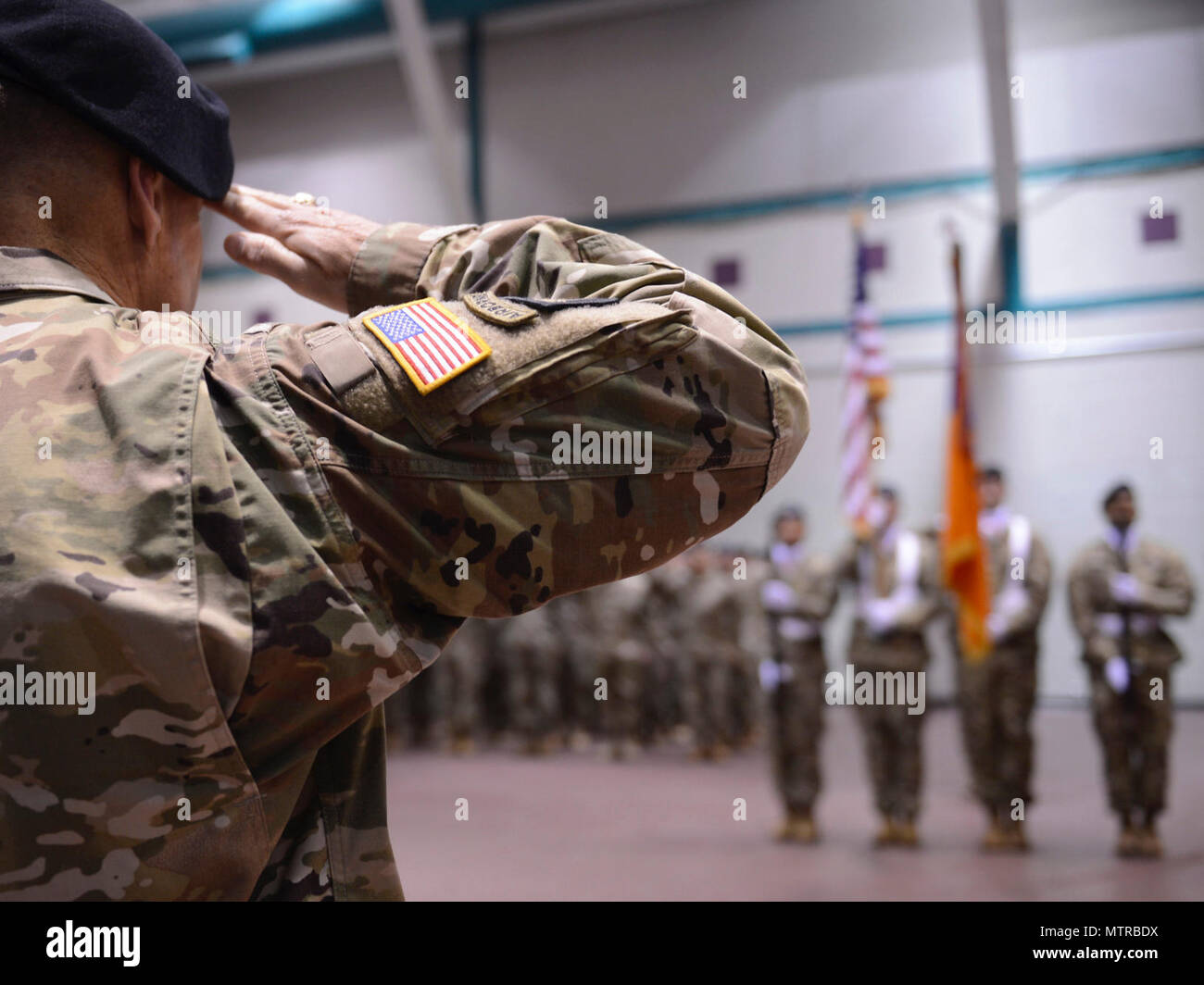 U.S. Army Col. John Smith, 128th Aviation Brigade commander, salutes ...