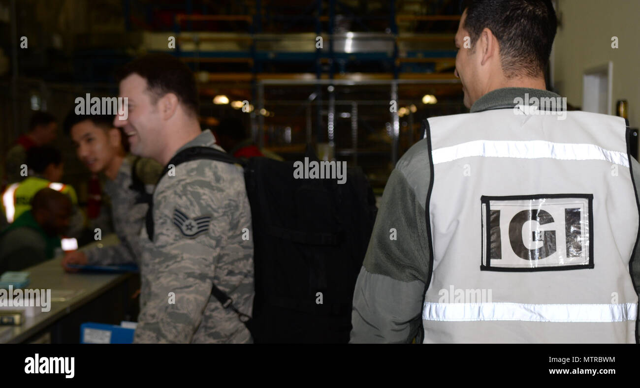 A U.S. Air Force Inspector General unit inspector observes the ...