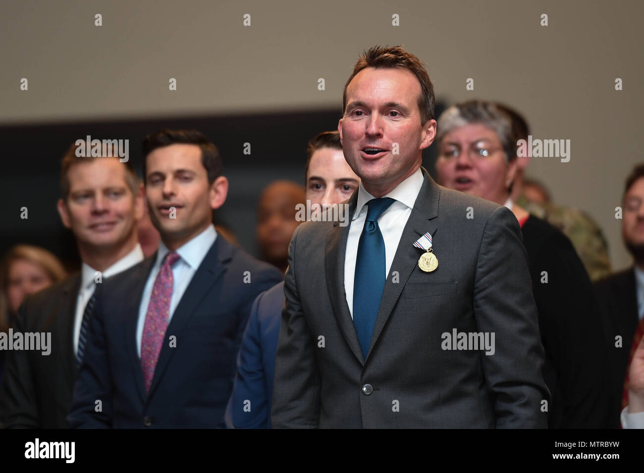 Secretary of the U.S. Army Eric K. Fanning sings the Army song during ...