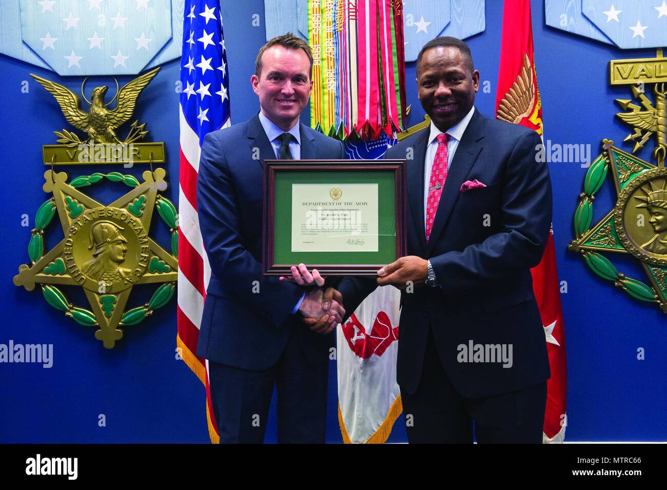 Secretary of the Army Eric Fanning presents the Civilian Aide to the ...