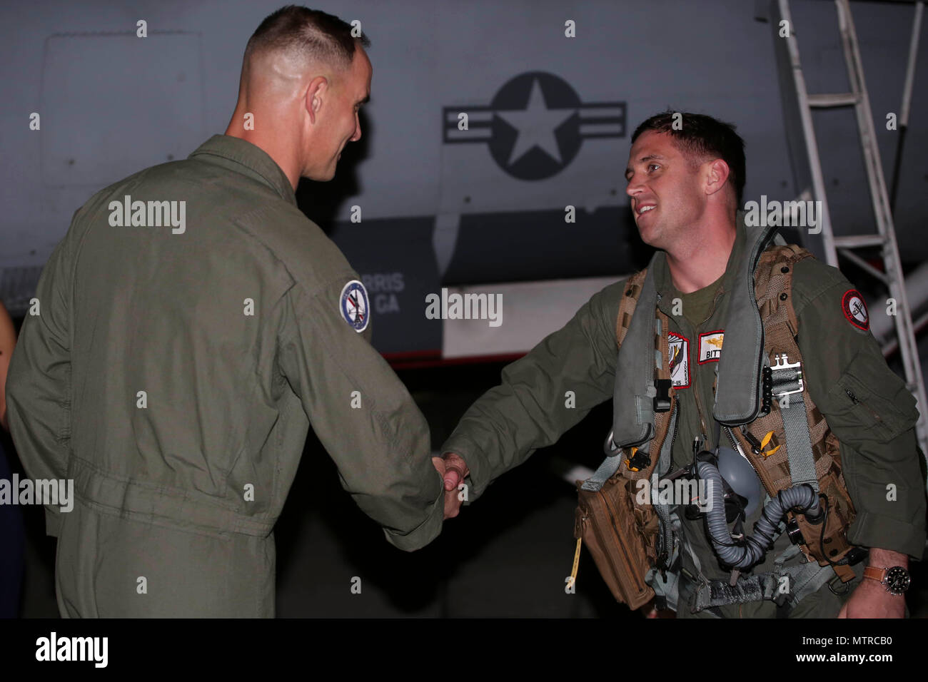 Col. Robert Cooper, left, welcomes Lt. Col. Shannon M. Brown, right ...