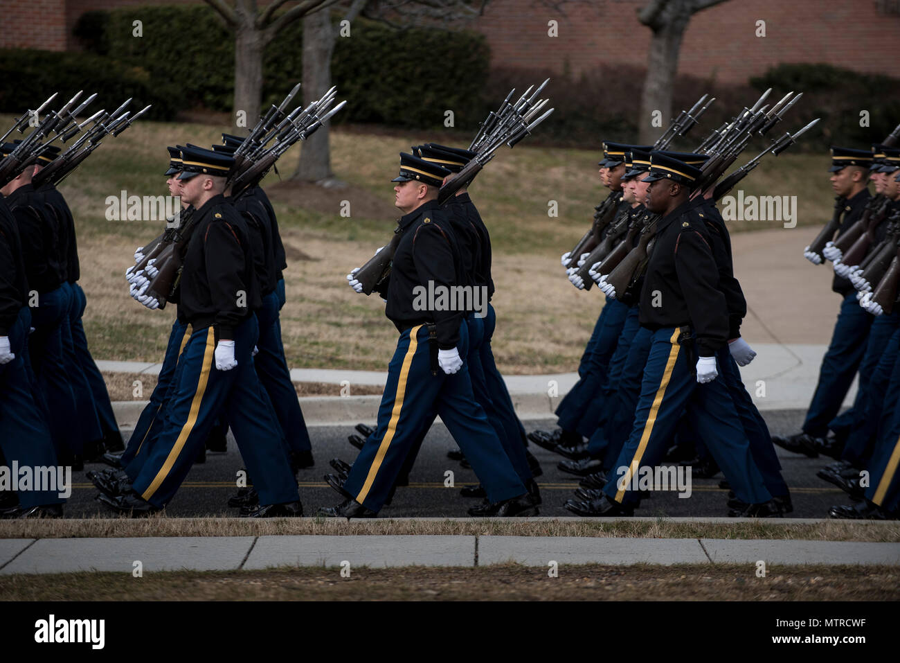 Soldiers from the 3rd U.S. Infantry Regiment (The Old Guard) march on a ...