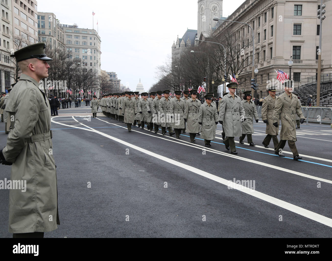 U.S. Marines collapse their cordon along Pennsylvania Avenue, during ...