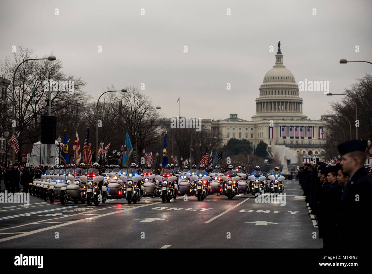 Police motorcyclists take part in the 58th Presidential Inauguration ...