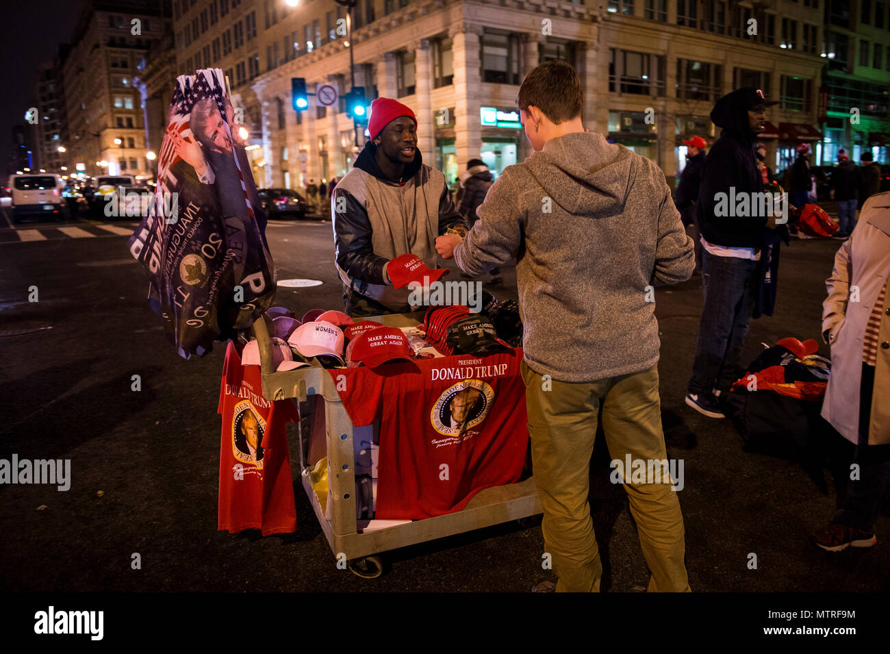 A street vendor sells presidential merchandise after the 58th ...