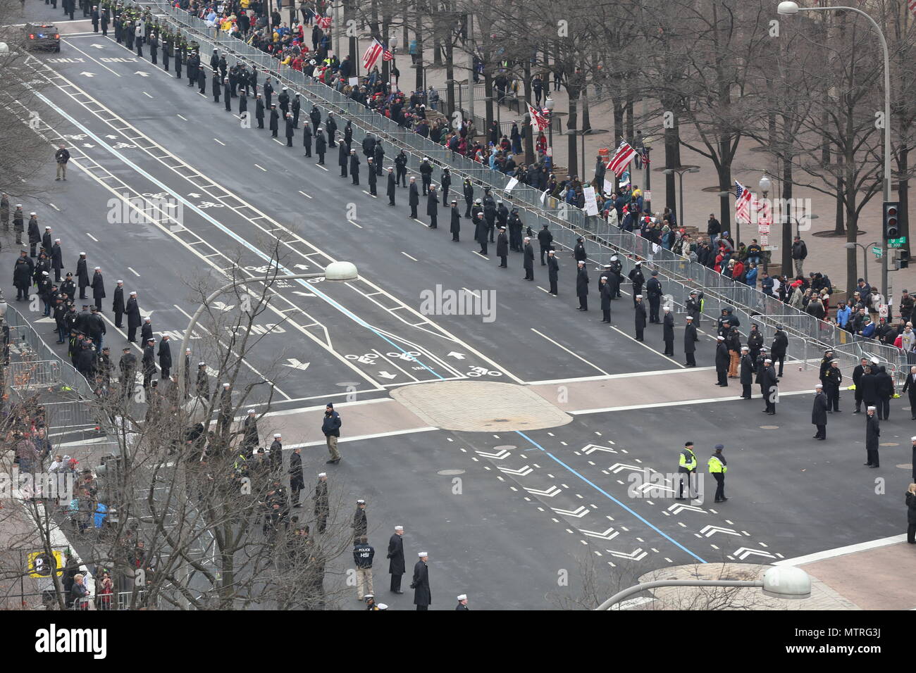 Members of the U.S. Navy and members of law enforcement cordon off ...