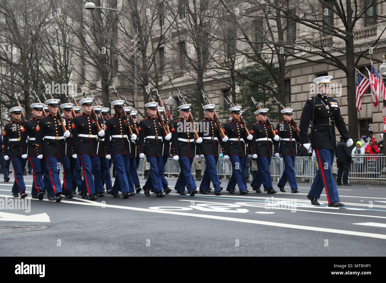 U.S. Marine Corps Honor Guard marches by Freedom Plaza along ...