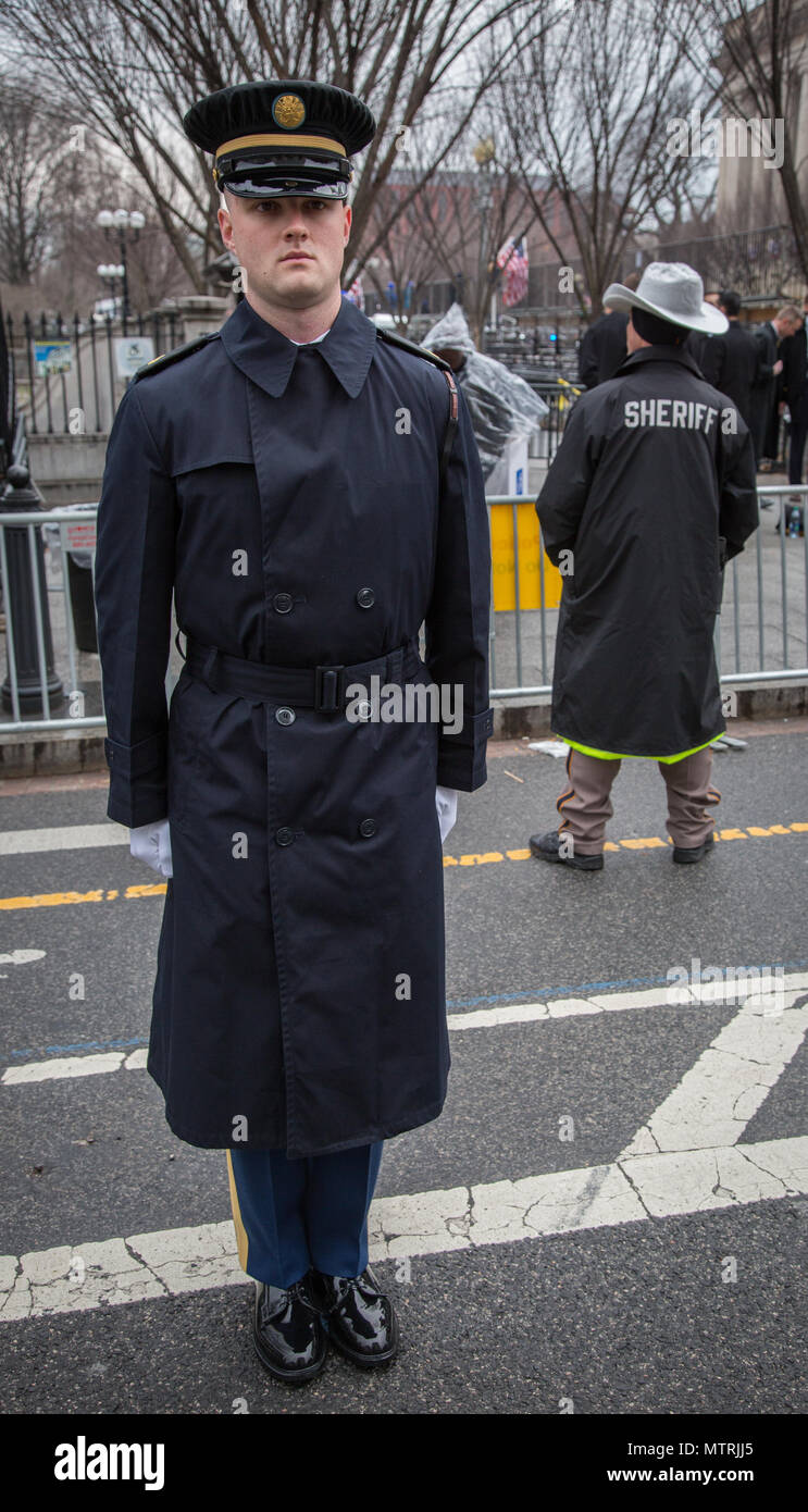 U.S. Army Cordon Sgt. Matthew Harp lines the parade route during the ...