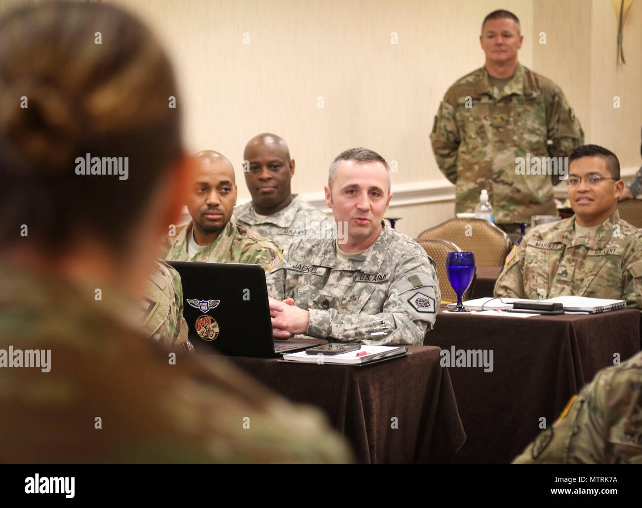 Army Reserve Staff Sgt. Timothy Jaekel (center), a platoon sergeant ...
