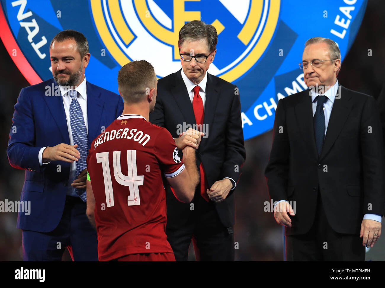 Liverpool owner John W Henry (centre) and Real Madrid President ...